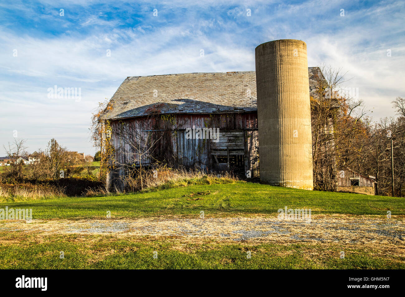 Rundown Farm at Sunset Stock Photo - Alamy