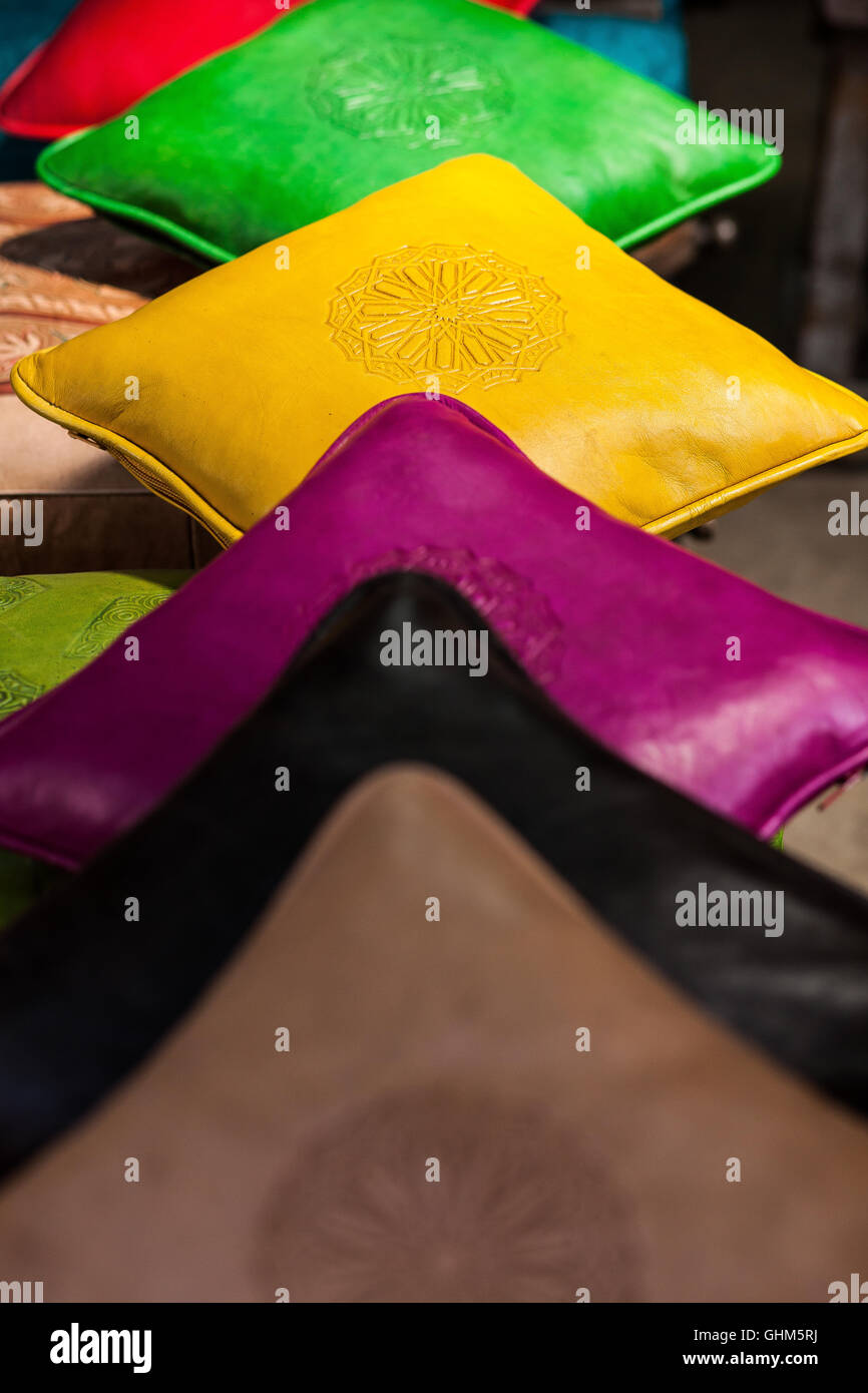 Different color decorative pillows in a row Stock Photo - Alamy