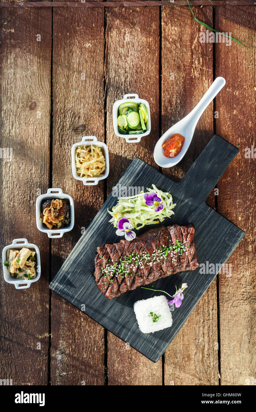 Korean BBQ with full side dishes, top view Stock Photo - Alamy