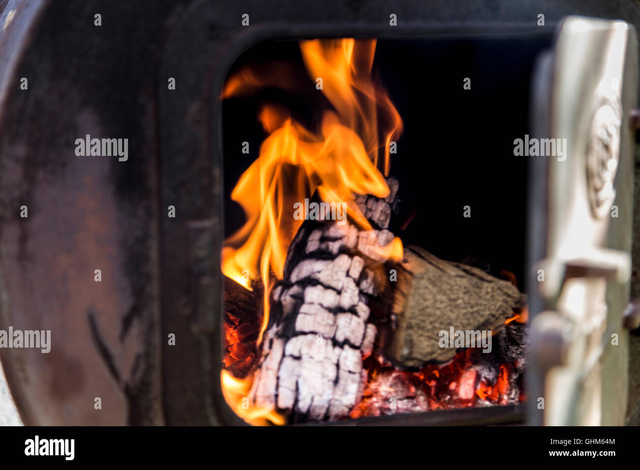 firewood burning on smoker Stock Photo - Alamy