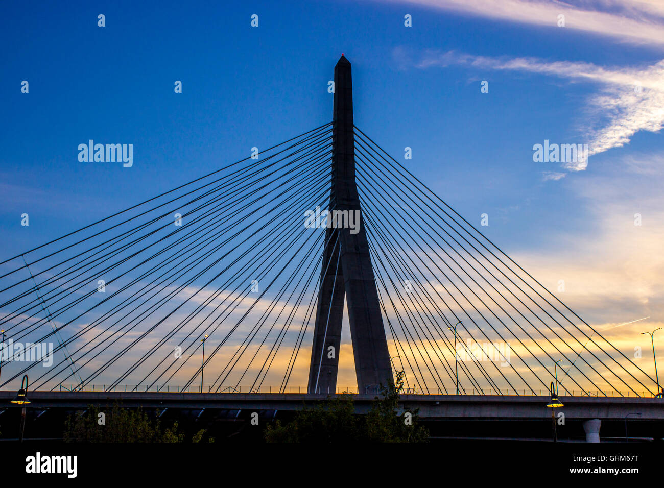 Leonard P. Zakim Bunker Hill Memorial Bridge on sunset Stock Photo - Alamy