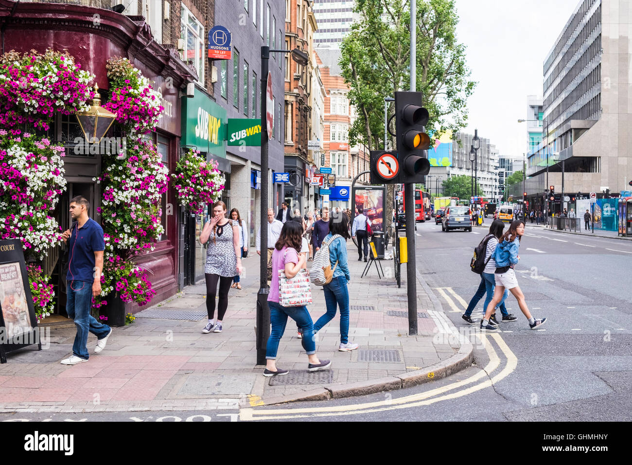 Morning commuters on Tottenham Court Road, London, England, U.K Stock ...