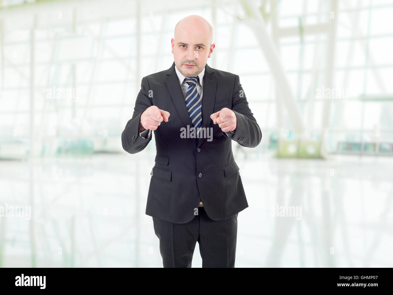 young business man pointing, at the office Stock Photo - Alamy