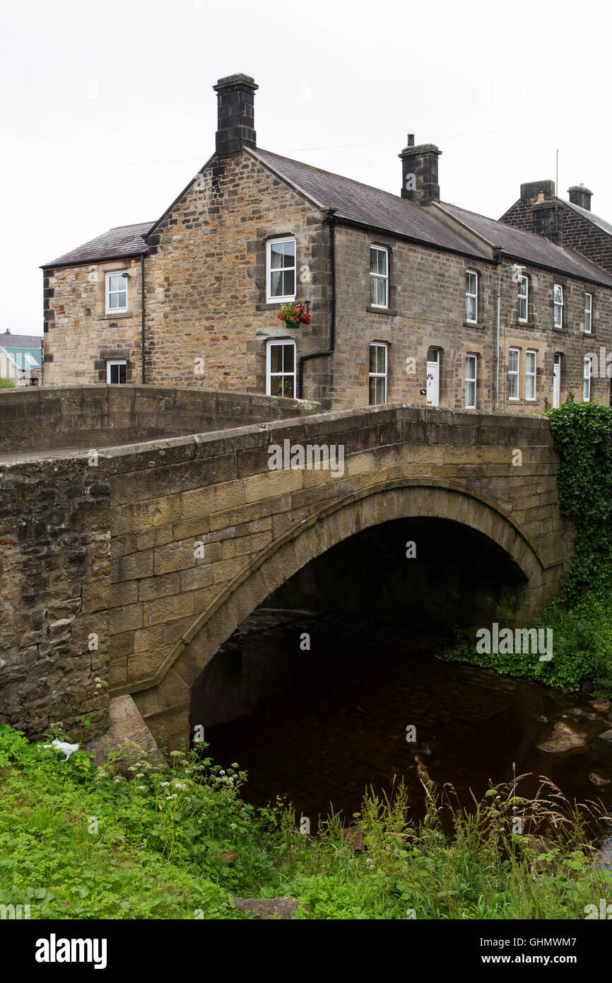 Stone buildings by the road bridge at Bellingham in Northumberland ...