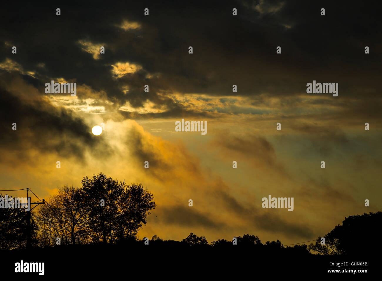 Sun Behind Clouds Stock Photo - Alamy