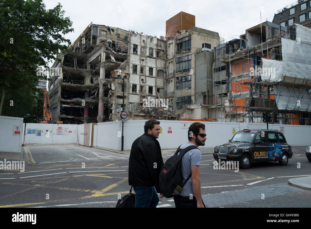 Demolition site as one old building after another is torn down for ...
