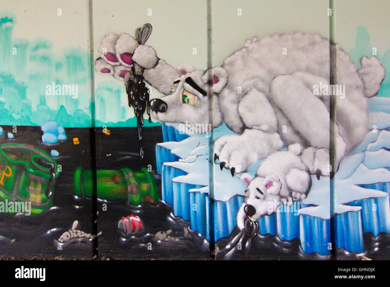 A shot of a colourful graffiti piece displaying environmental issues ...