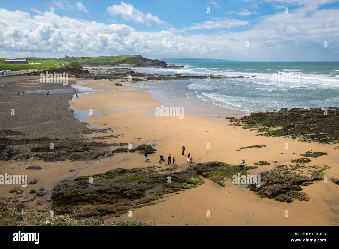 A group of people on Crooklets Beach, Bude, Cornwall, England, UK Stock ...