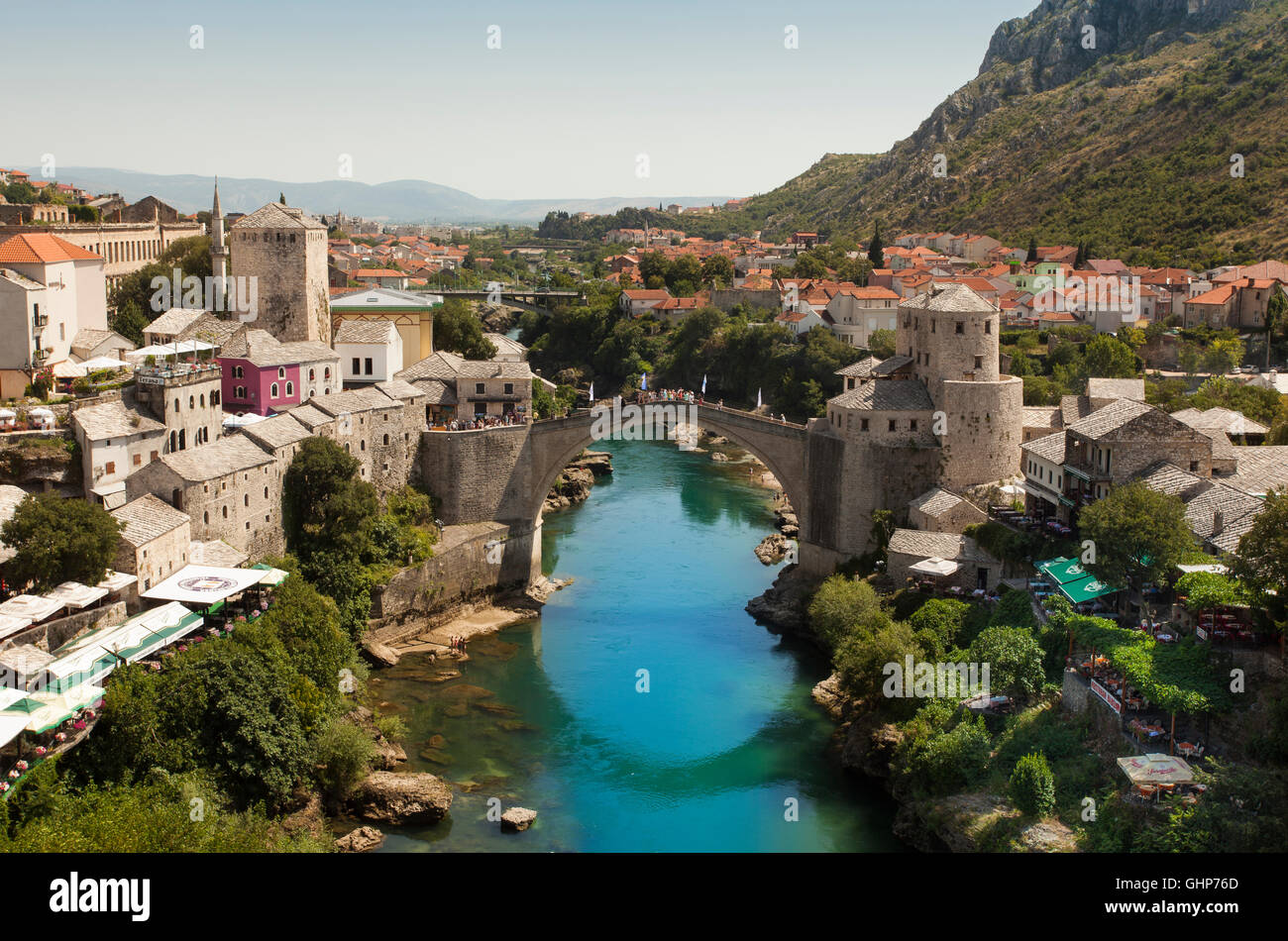 The river Neretva flows under the Stari Most bridge in city of Mostar ...