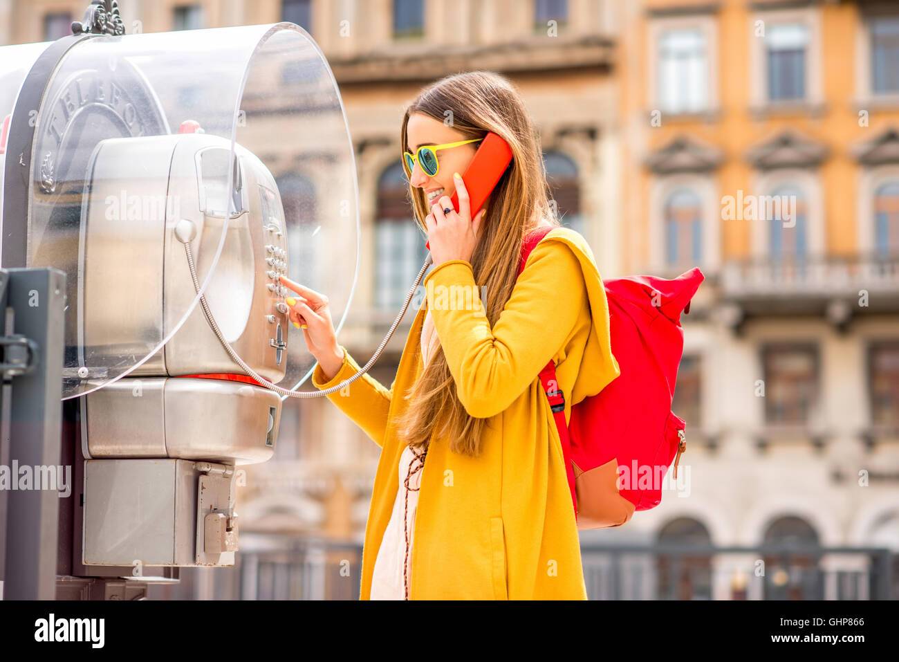 Woman calling with call box Stock Photo - Alamy