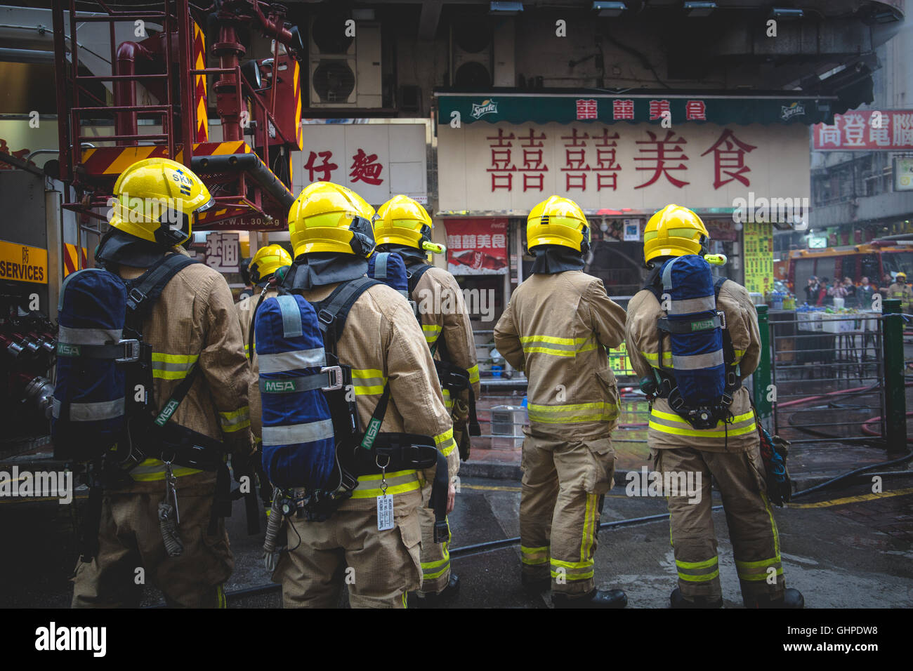 Fire Fighters In Action Stock Photos & Fire Fighters In Action Stock ...