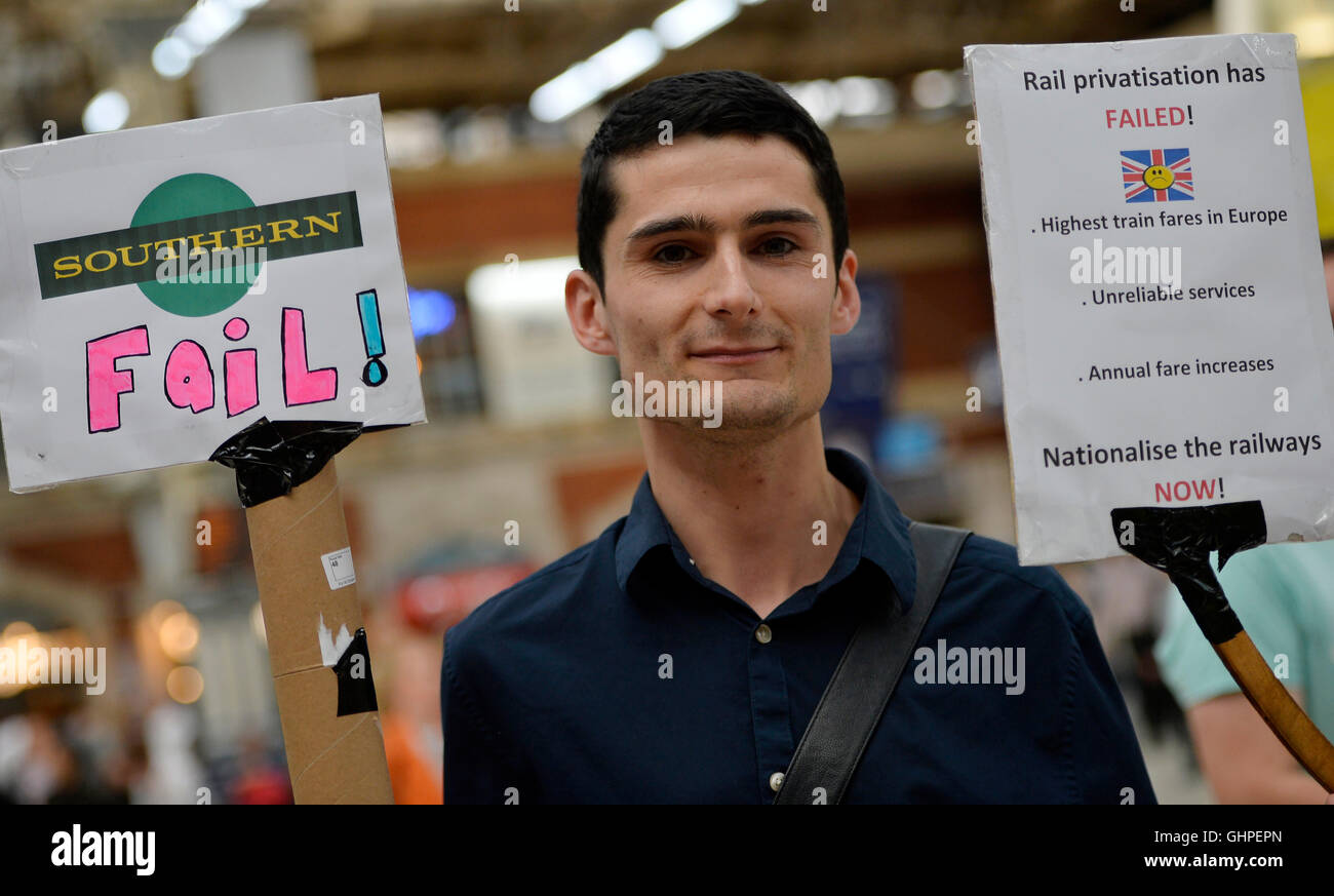Southern Rail passenger joins a rail strike protest at London Victoria ...