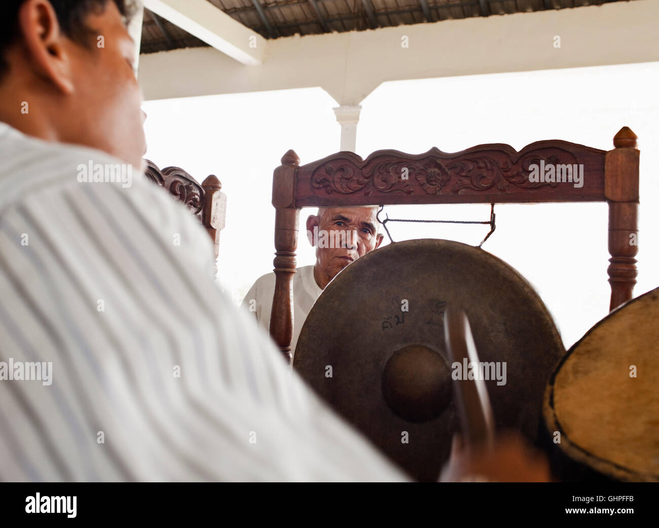 Master musician Seng Norn teaches a student Kantoam Ming music at a Wat ...
