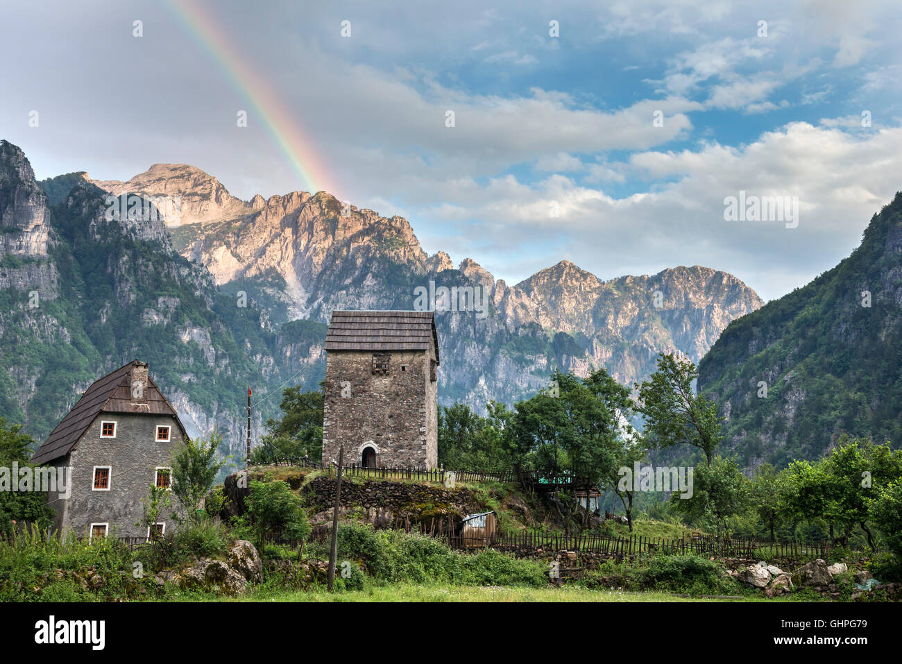The Kulla, lock-in tower at Theth, with the Albanian Alps in the ...
