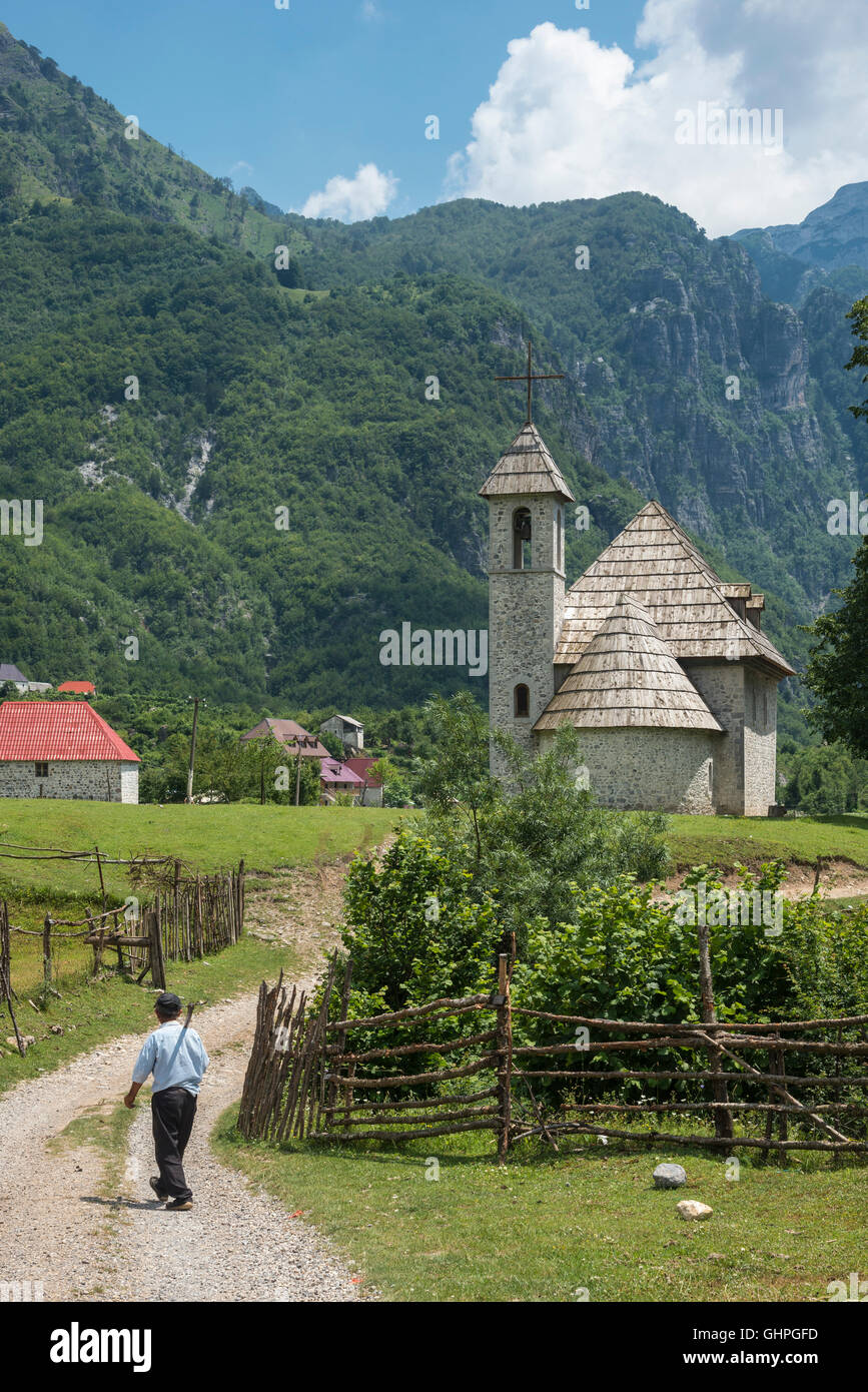 The village of Theth, with its shingle roofed church, Northern Albania ...
