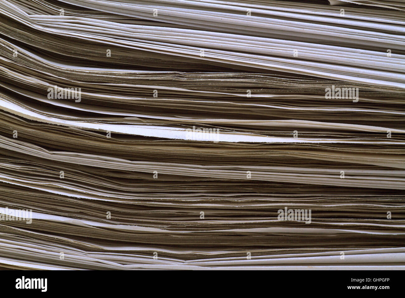 Image of a stack of newspaper. Shot in Studio Stock Photo - Alamy