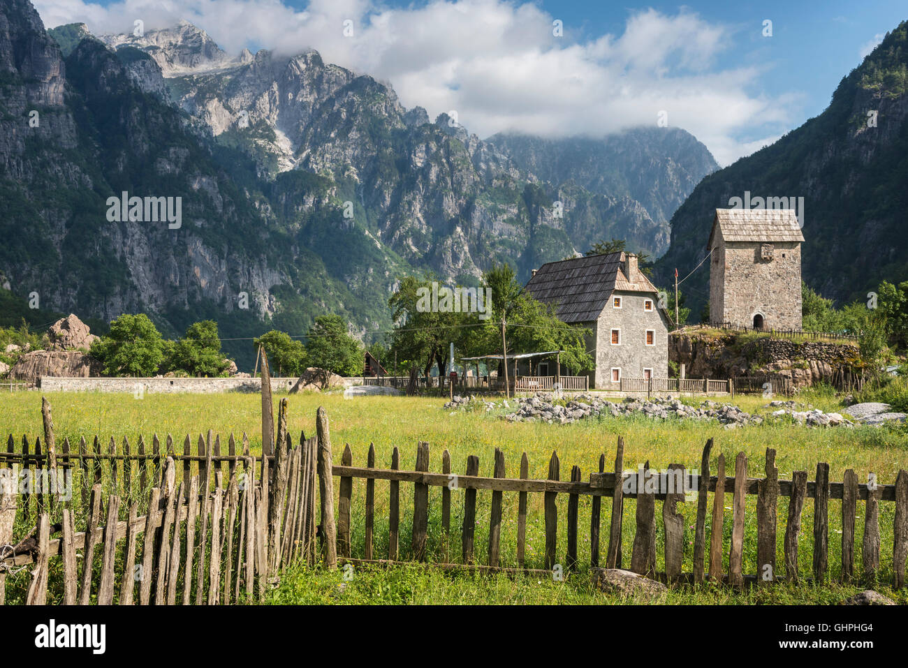 Pasture at Theth with the Kulla, lock-in tower and the Albanian Alps in ...