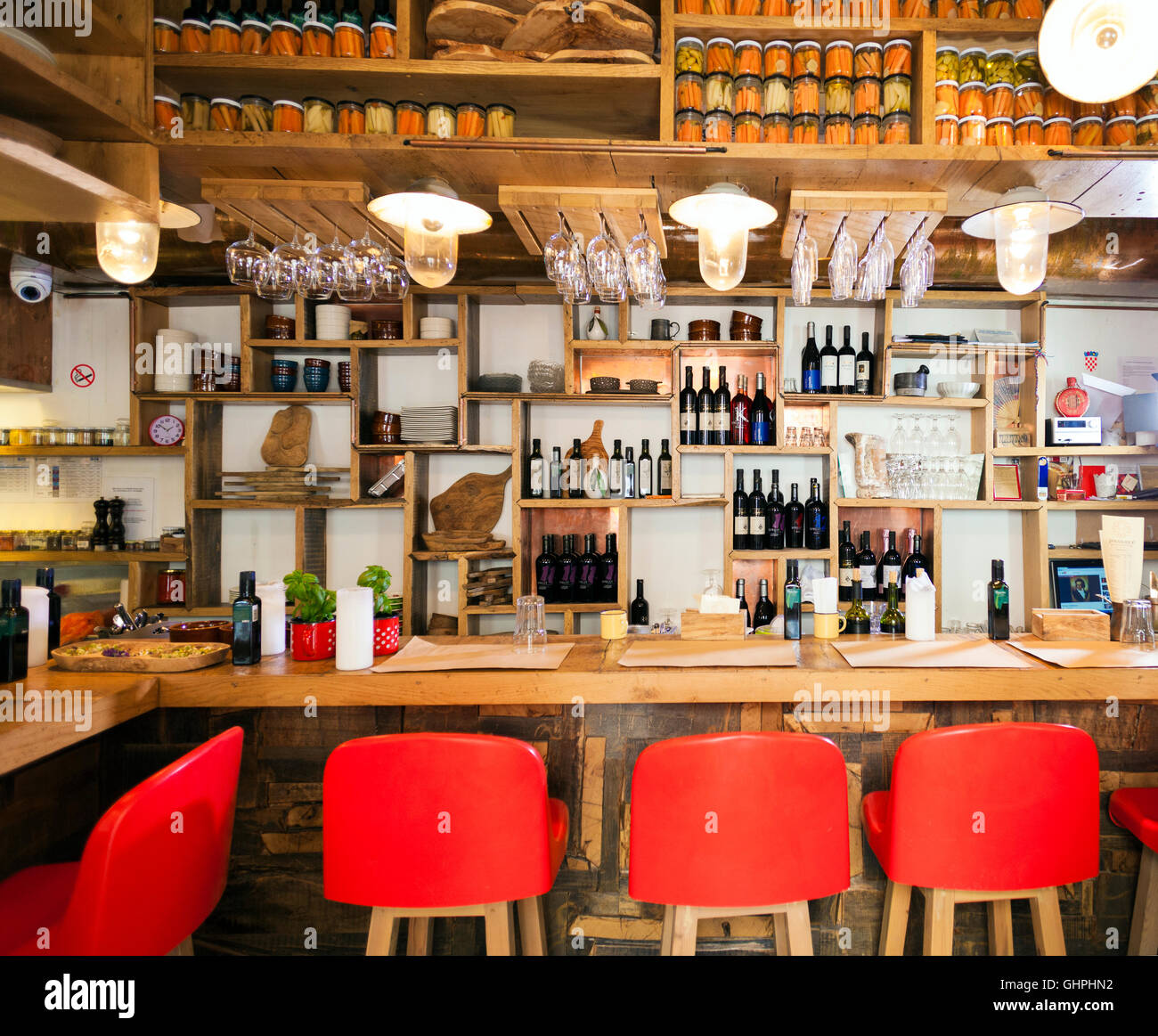 Wine bar with counter and stools in Split Stock Photo - Alamy