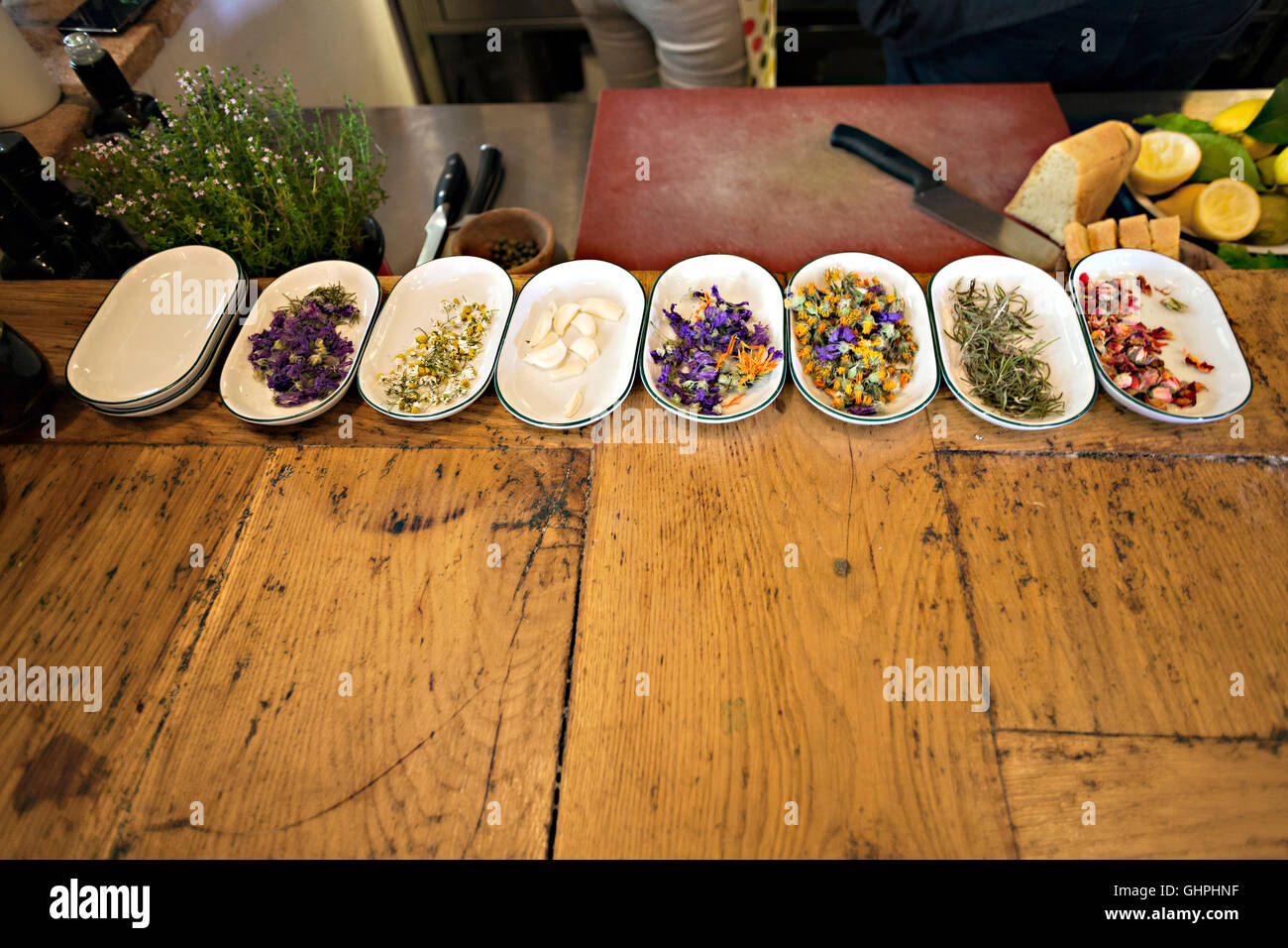 Plates with ingredients placed in a row on kitchen counter Stock Photo ...