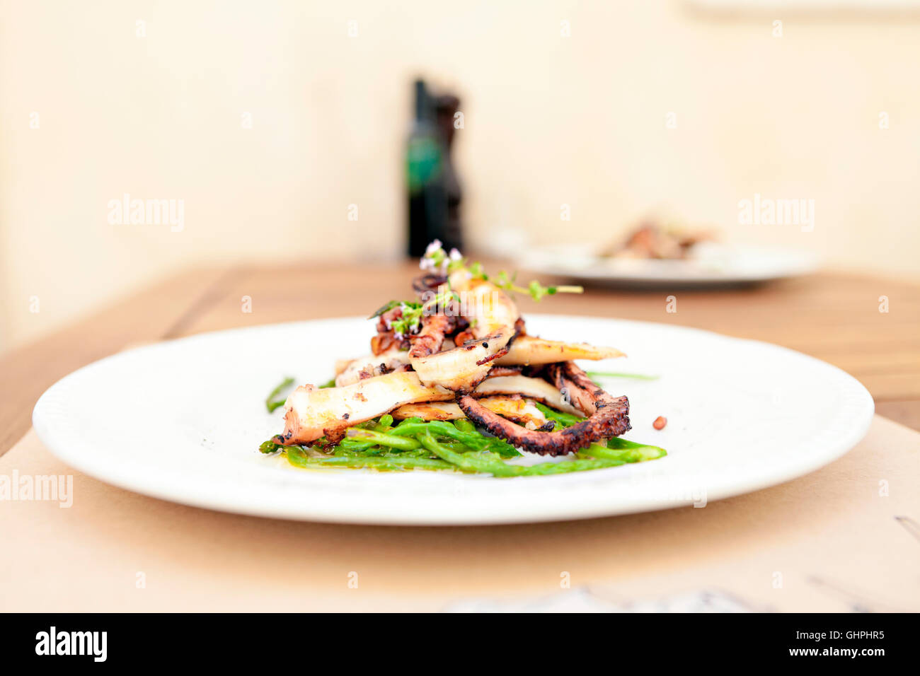 Calamari people hi-res stock photography and images - Alamy