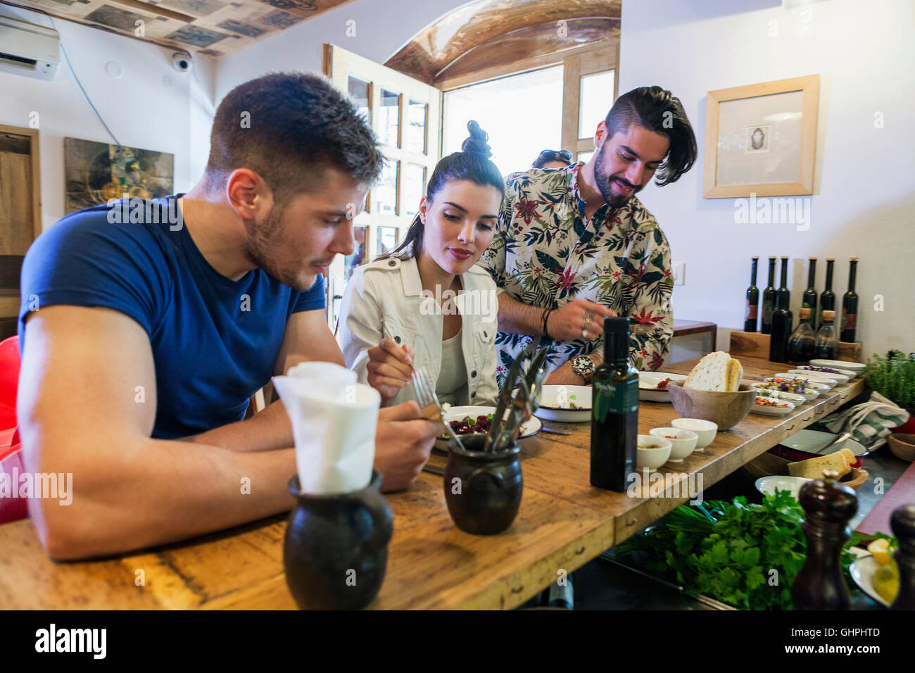Young men at bar counter hi-res stock photography and images - Alamy