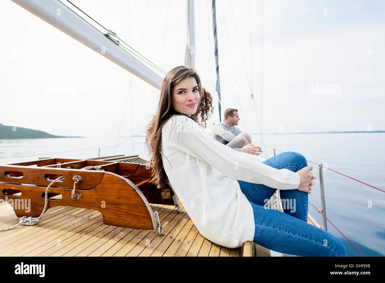 Beautiful woman sitting boat hi-res stock photography and images - Alamy