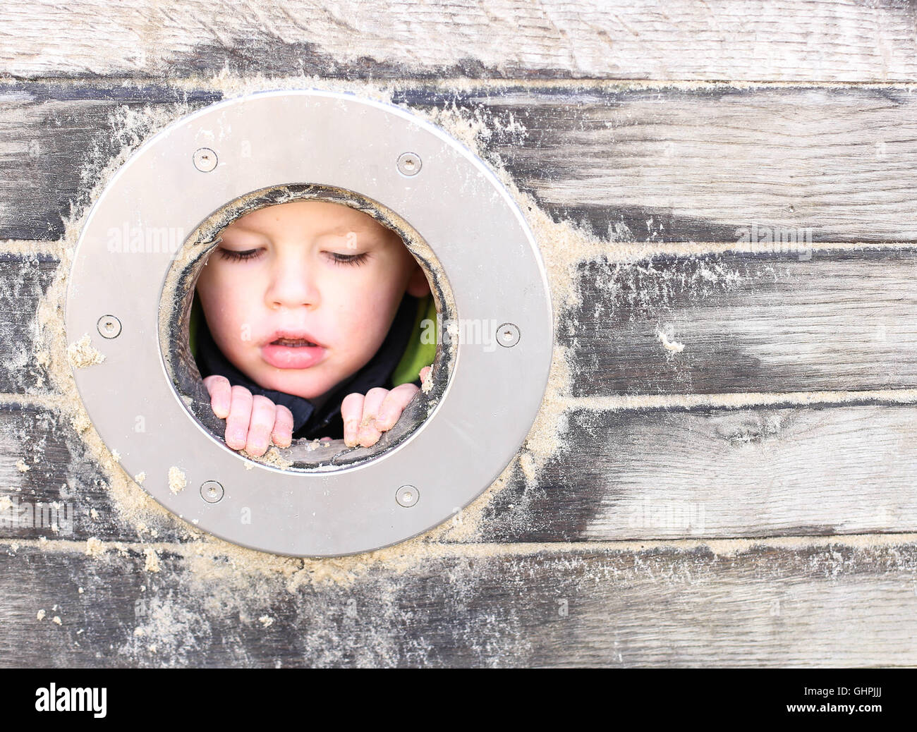 handsome toddler boy looking down through boat porthole Stock Photo - Alamy handsome toddler boy looking down through boat porthole Stock Photo - Alamy