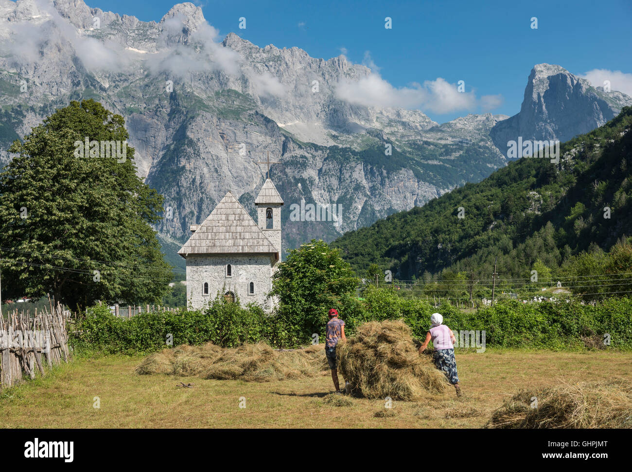 Looking across the village of Theth with its shingle roofed church and ...