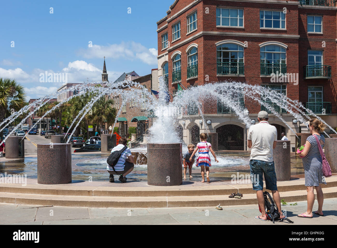 People enjoy one of the fountains in Waterfront Park in Charleston ...