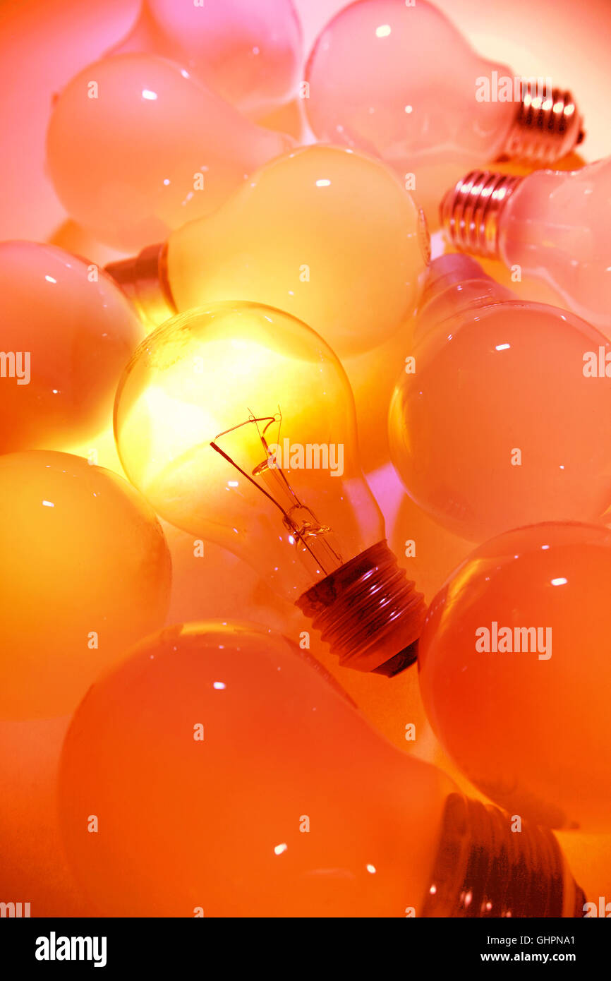 One bright bulb in crowd Stock Photo - Alamy