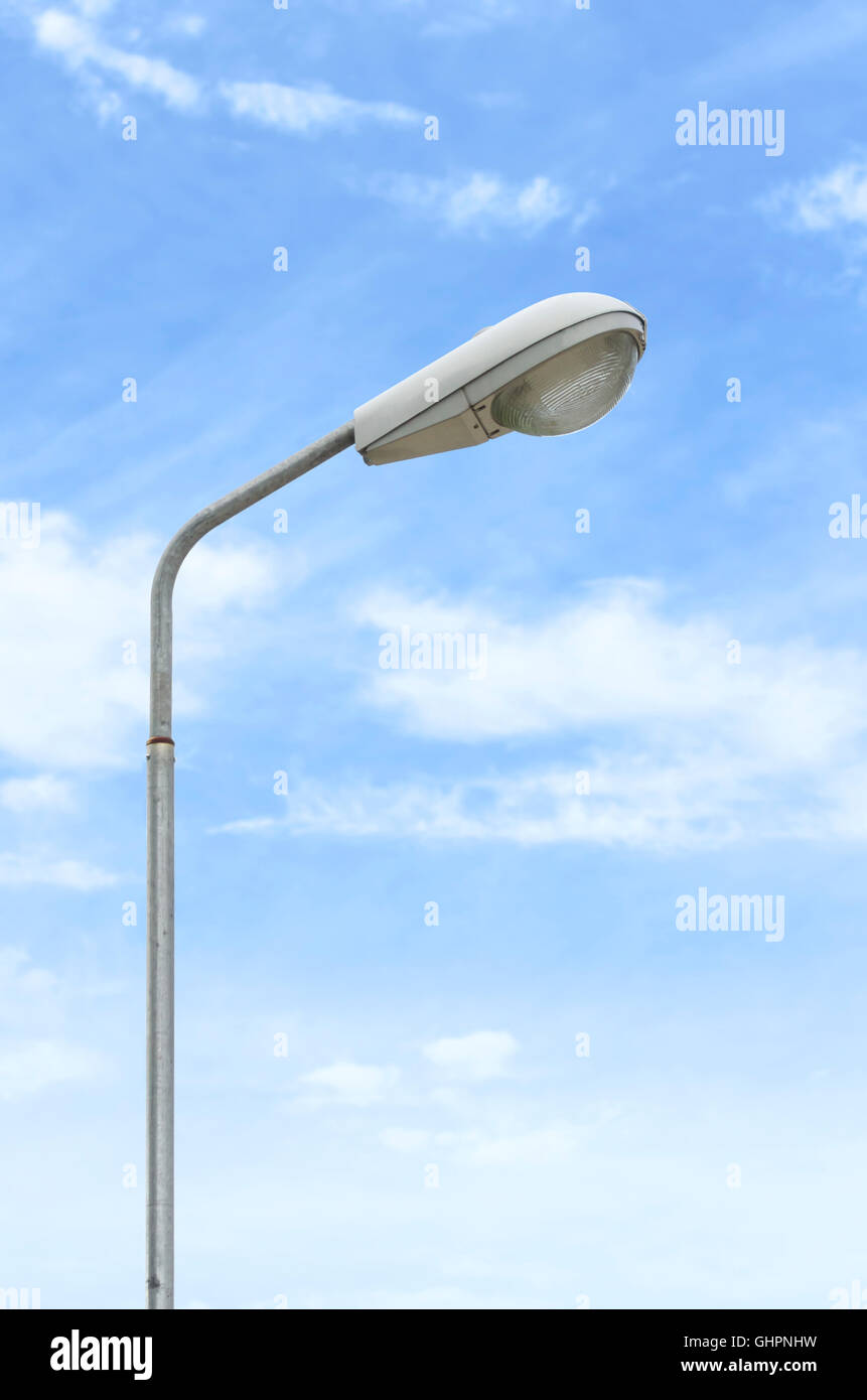 street lights illuminated in blue sky background Stock Photo - Alamy