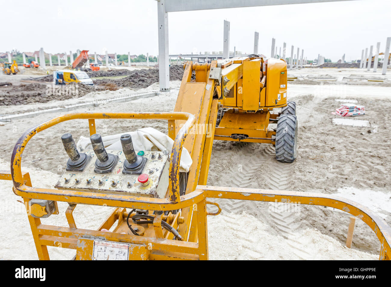 Control board of an industrial yellow cherry picker. Boom lift machine ...
