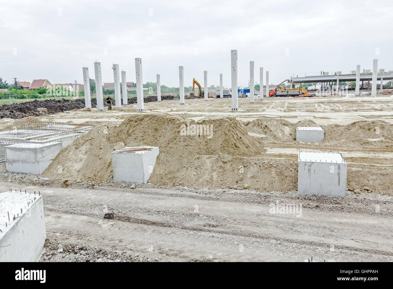 Concrete base of new edifice with reinforcement at building site is ...