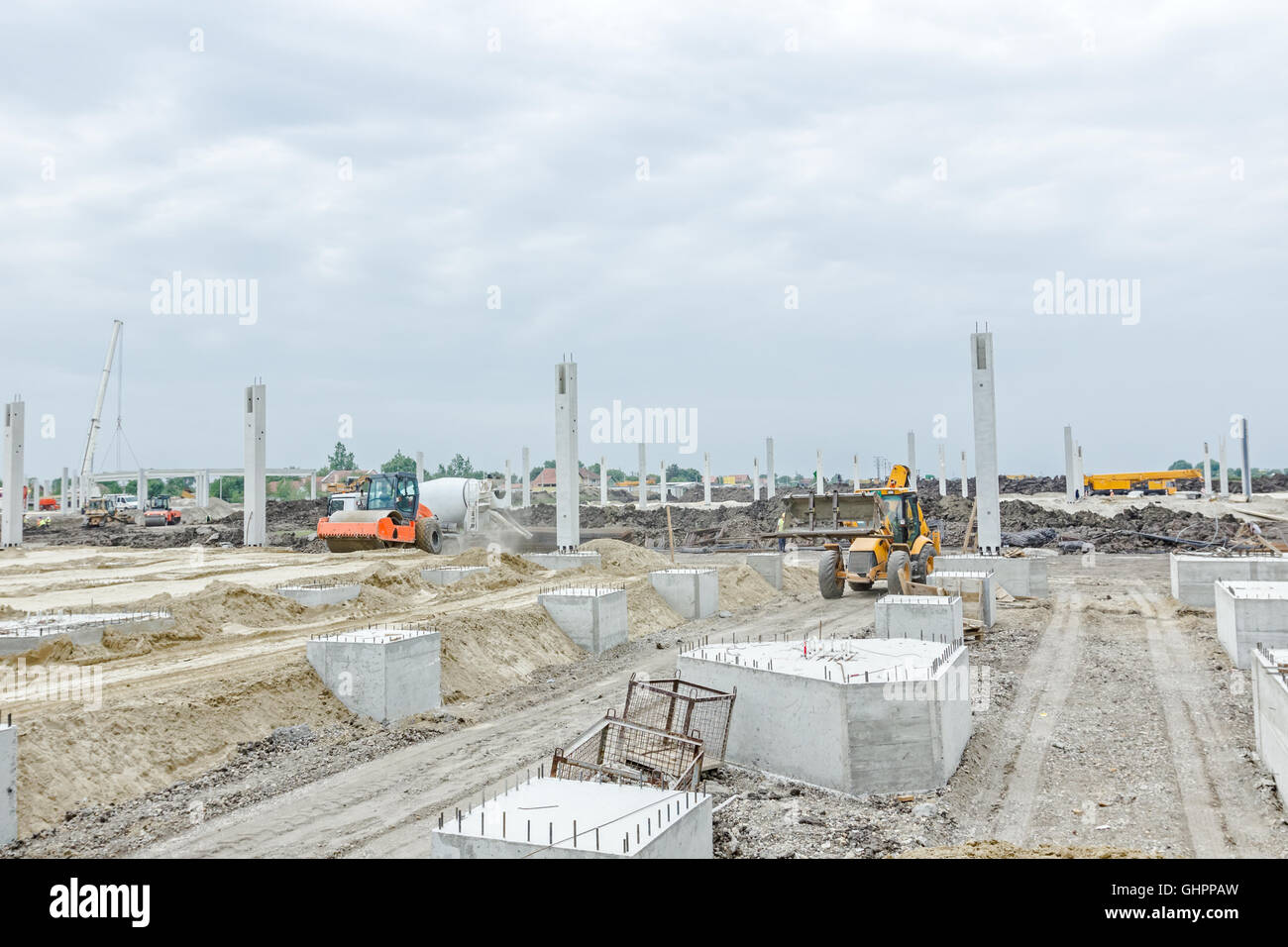 Concrete base of new edifice with reinforcement at building site is ...