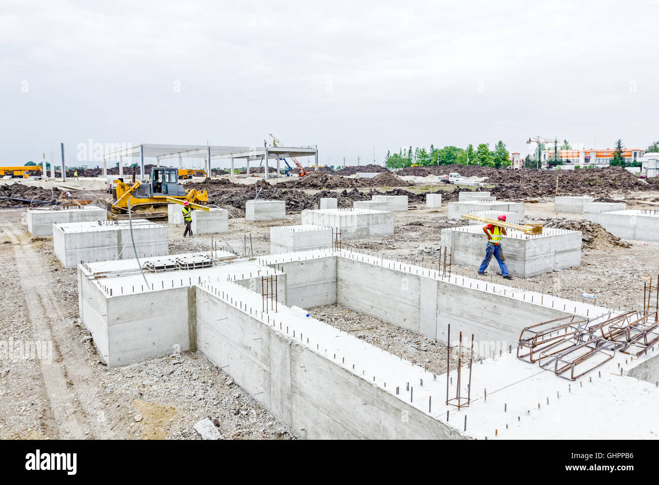 Workers carry building material construction hi-res stock photography ...