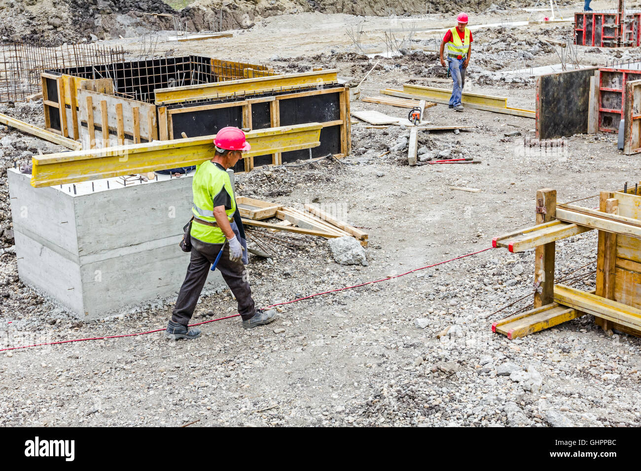 Workers carry building material construction hi-res stock photography ...