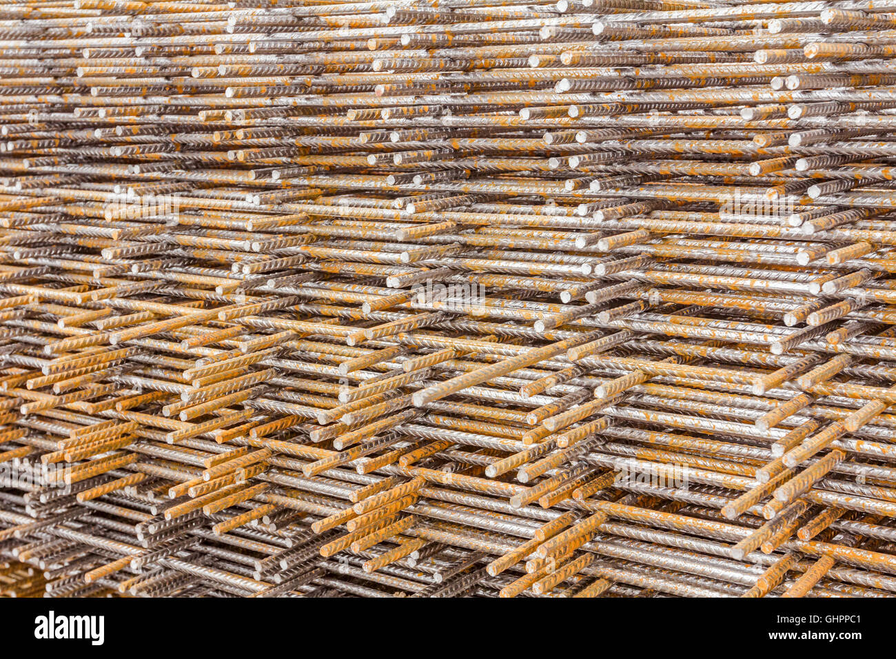 Spikes of rebar grid, reinforcing mesh, steel bars stacked for ...