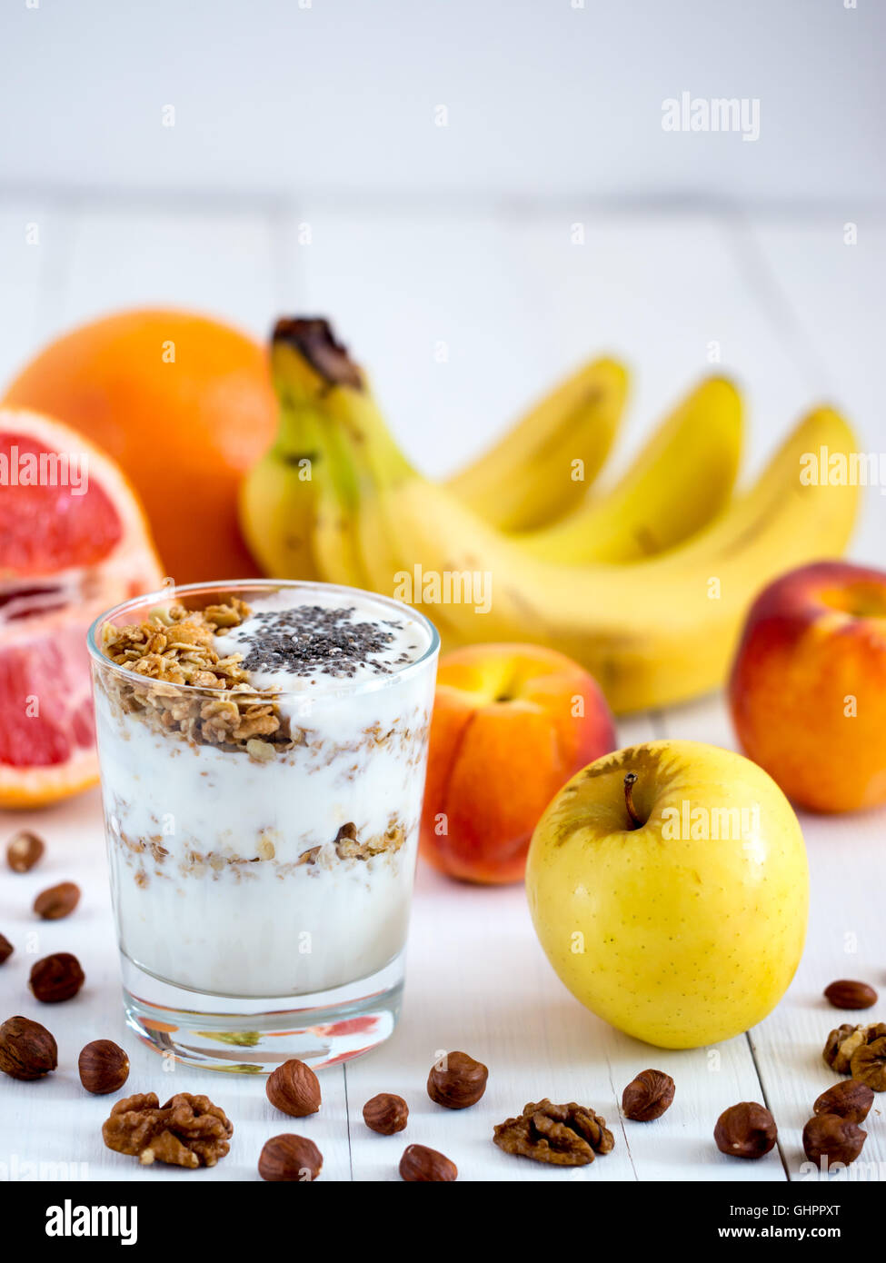 yogurt, with fresh fruits and nuts Stock Photo - Alamy