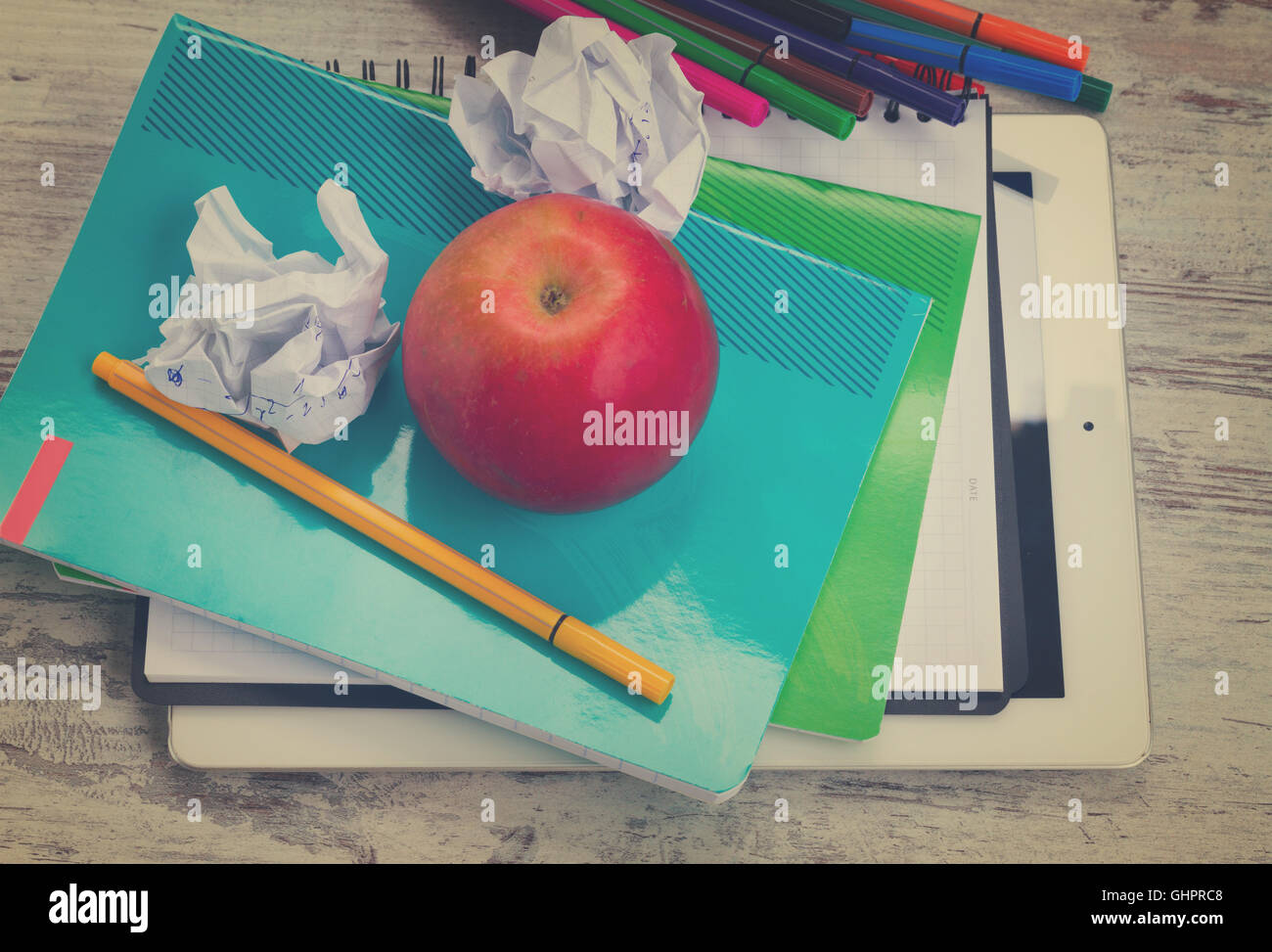 Apple with school supplies Stock Photo - Alamy