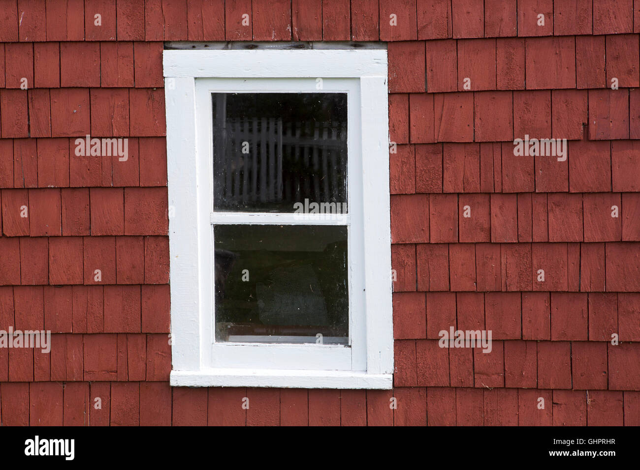 A window in a shingle-fronted house at Cupids in Newfoundland and ...