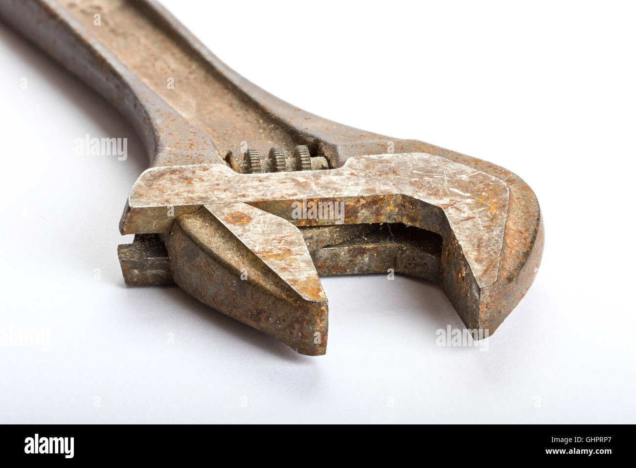 Close up of an old rusty adjustable wrench on a white back ground Stock ...