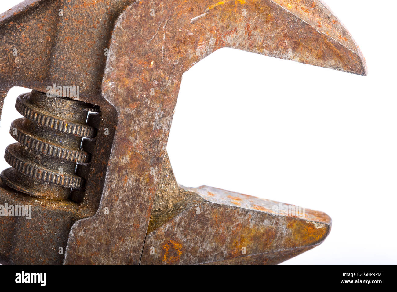 Close up of an old rusty adjustable wrench on a white background Stock ...