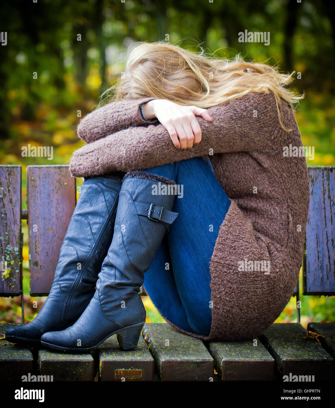 Depressive woman in autumn Stock Photo - Alamy