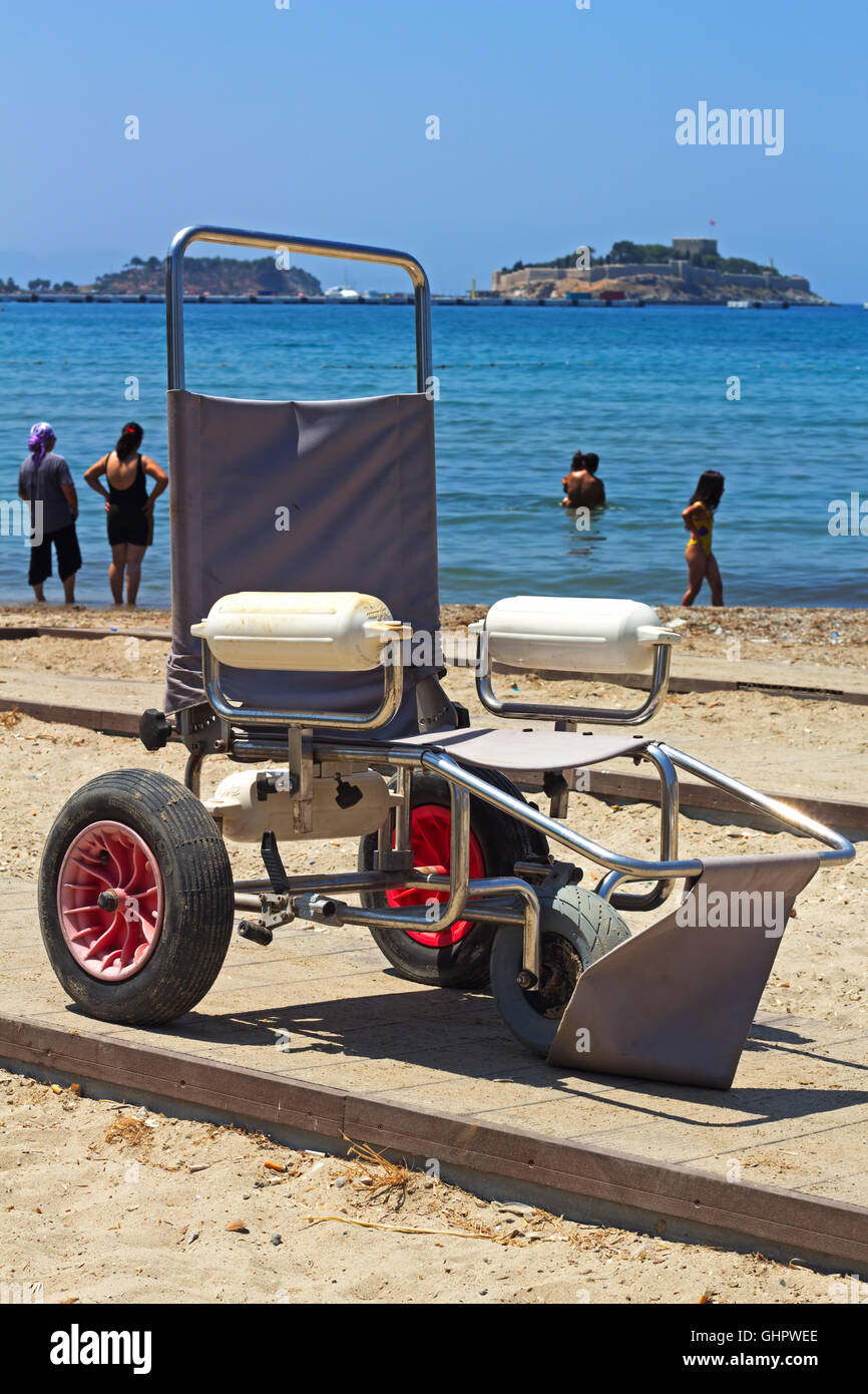 A wheelchair for hire with buoyancy floats that allows wheelchair users ...