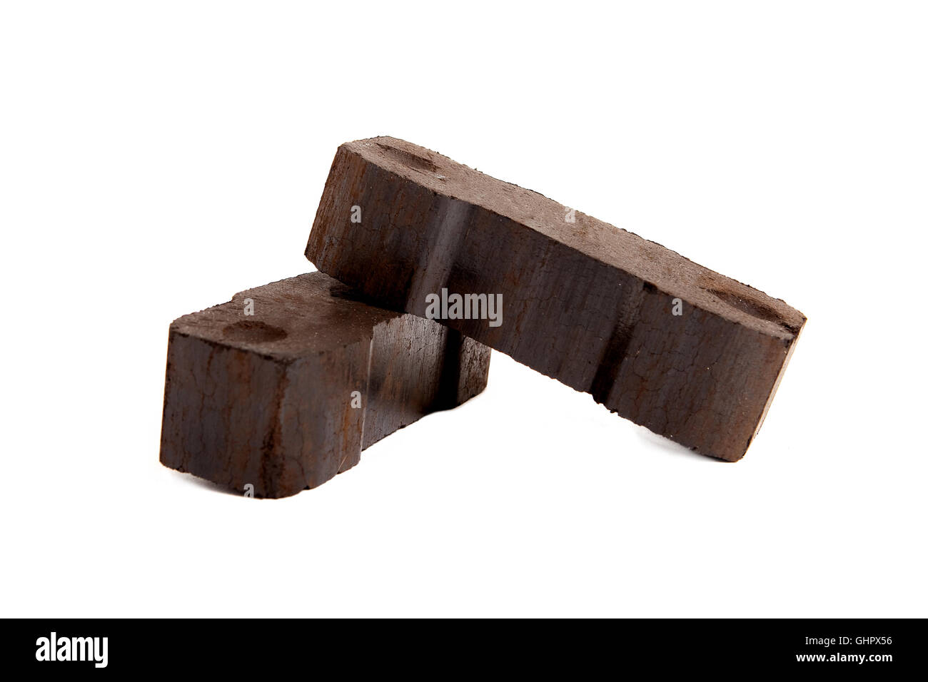 lignite, two bricks of coal, white background, isolated Stock Photo - Alamy