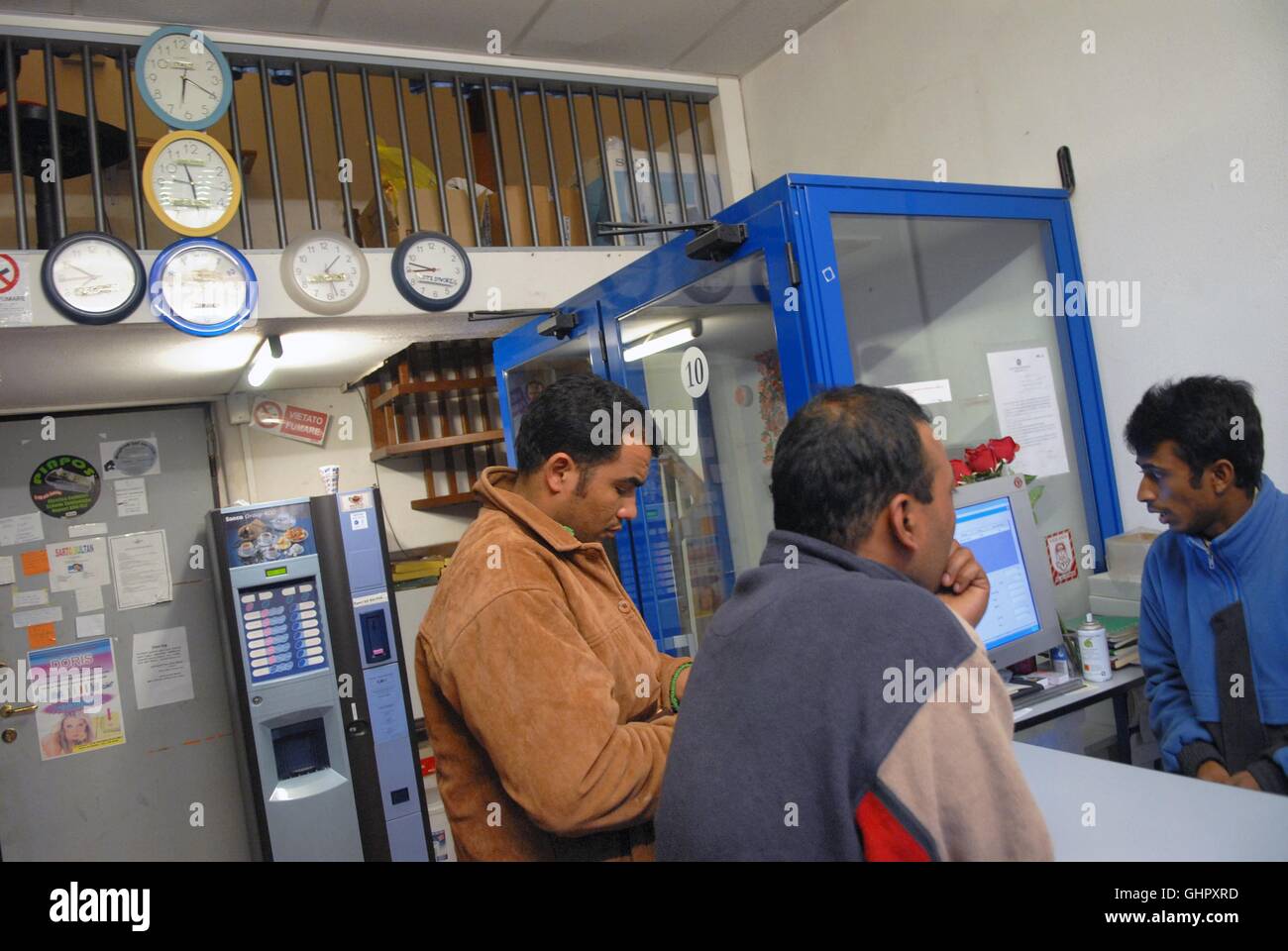 Milan (Italy), phone center and Internet shop Stock Photo - Alamy