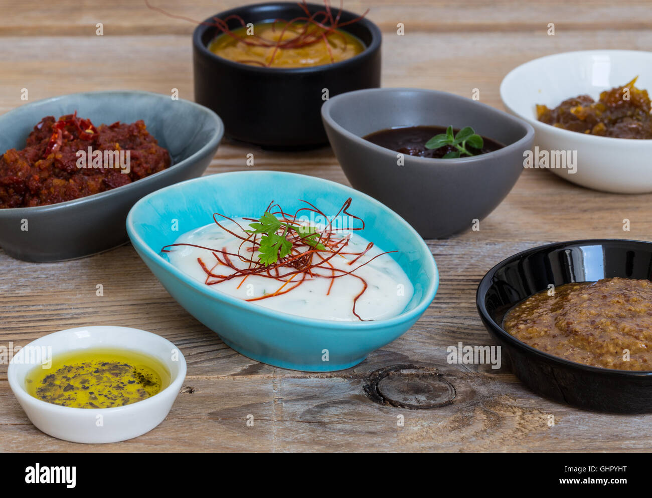 Variation of sauces and dips on wood background Stock Photo - Alamy