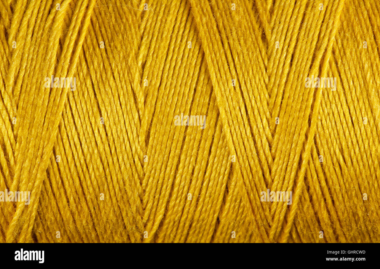 texture of yellow threads on the coil, closeup view Stock Photo - Alamy