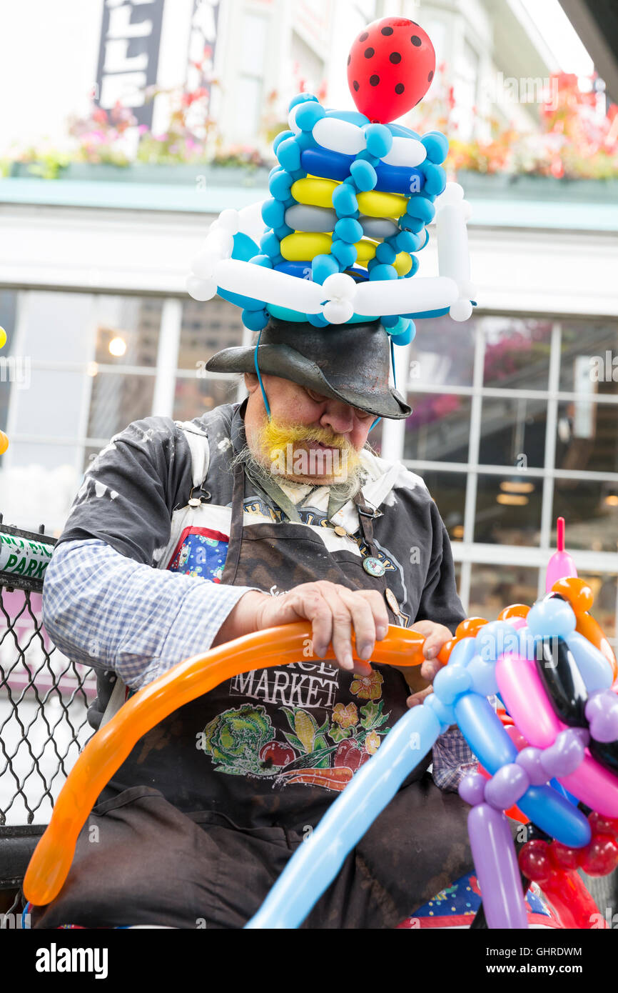 Balloon twisters hi-res stock photography and images - Alamy