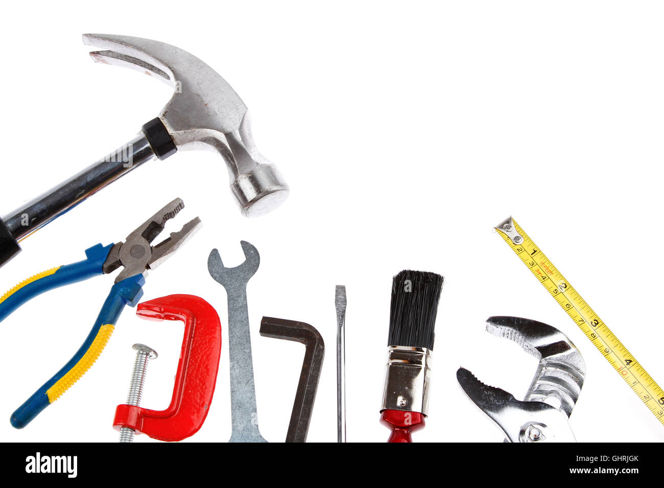 Assortment of tools on plain background Stock Photo - Alamy